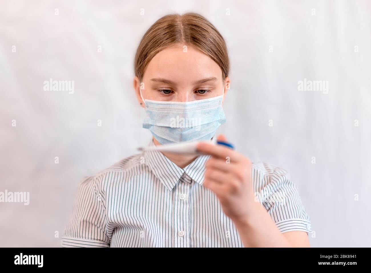 Teenager fever thermometer hi-res stock photography and images - Alamy