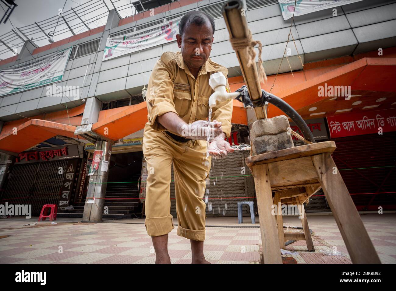 The defense worker is cleaning his hands with soap for fear of ...