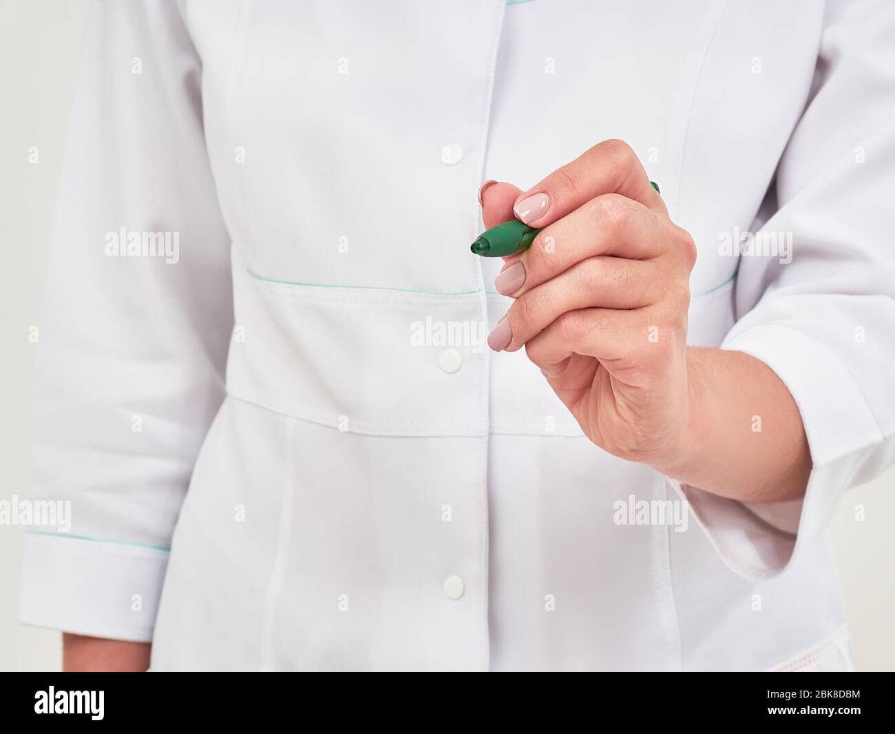 Doctor writing with marker. Doctor making notes. Medical personal with ...