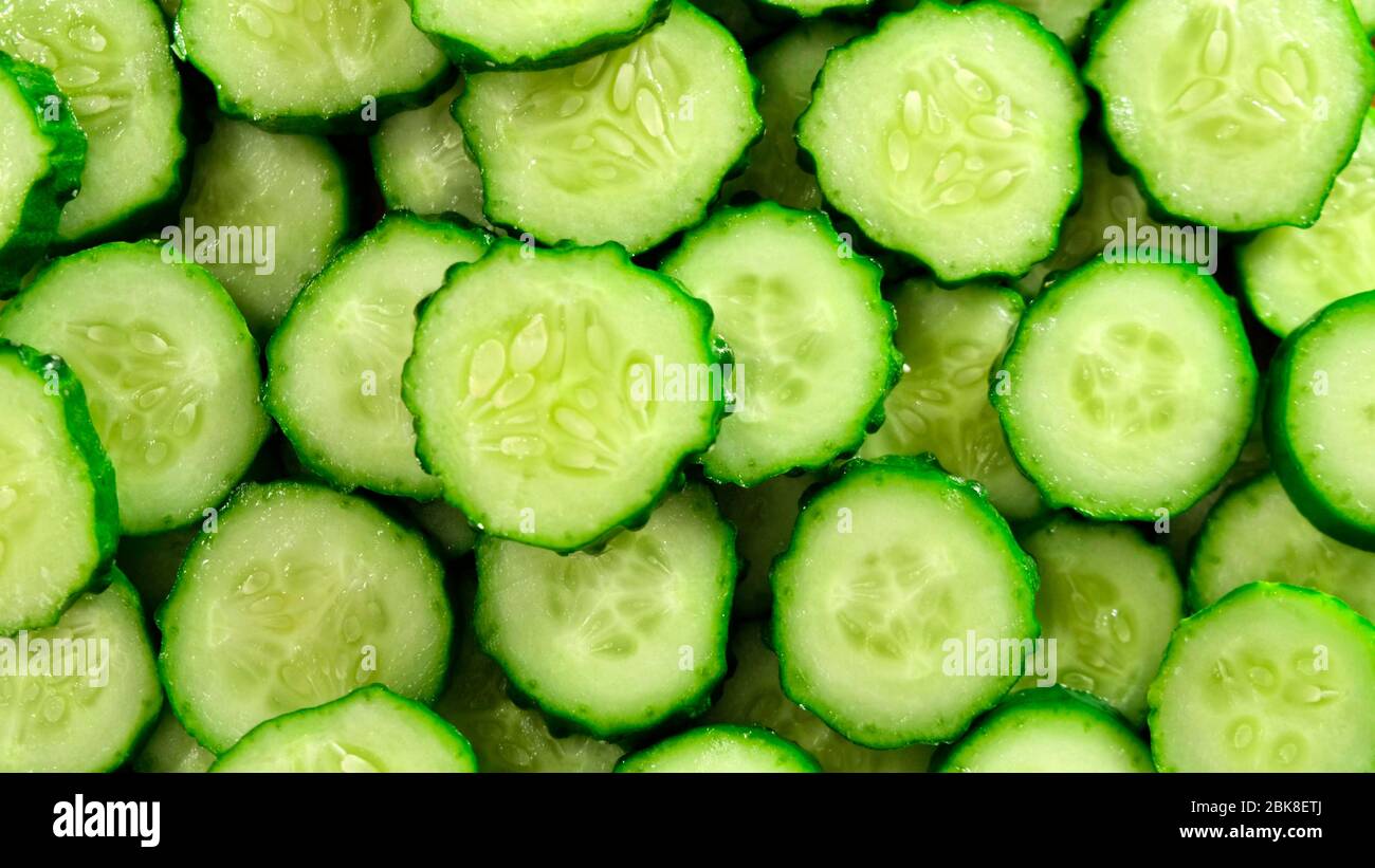 Top view of fresh sliced cucumber rotation. Close up Stock Photo - Alamy