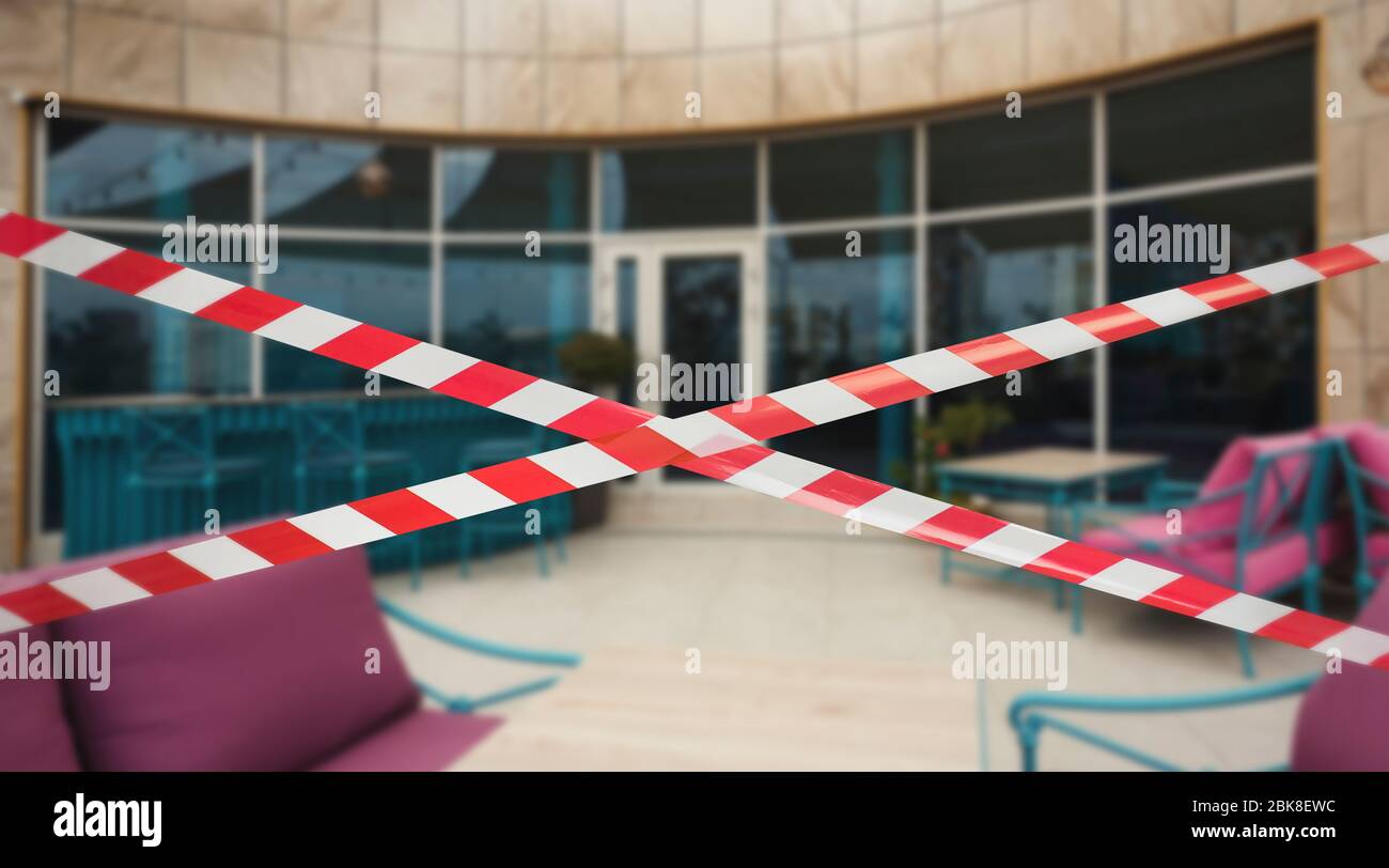 Hazard safety stripes across empty closed place Stock Photo - Alamy