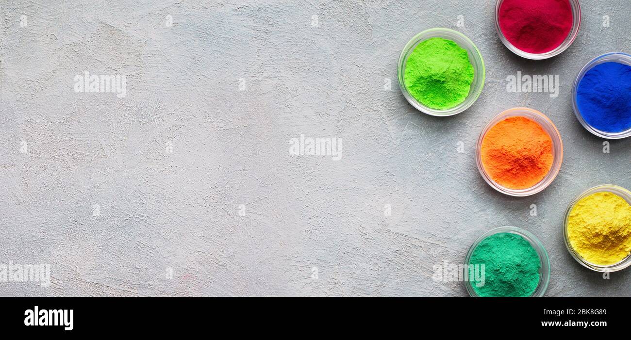 Traditional Holi celebration. Paint for playing at festival in plates ...