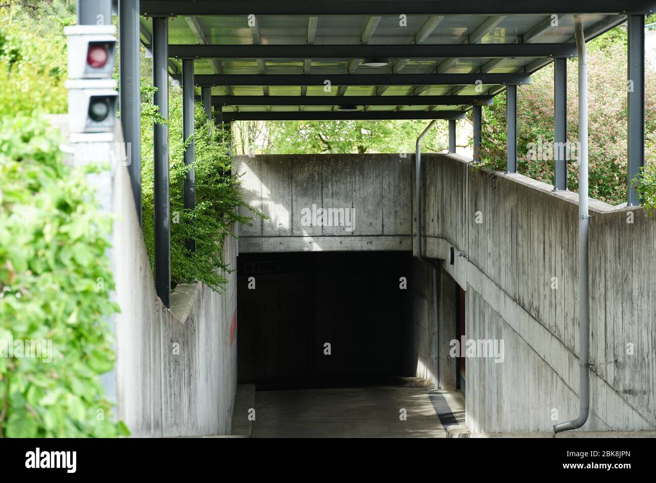 One lane entrance and exit of an underground garage or parking of a ...
