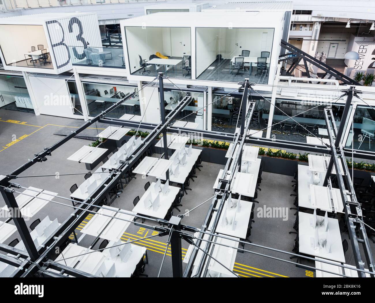 Top view of empty IT office, covered computers, no workers Stock Photo ...
