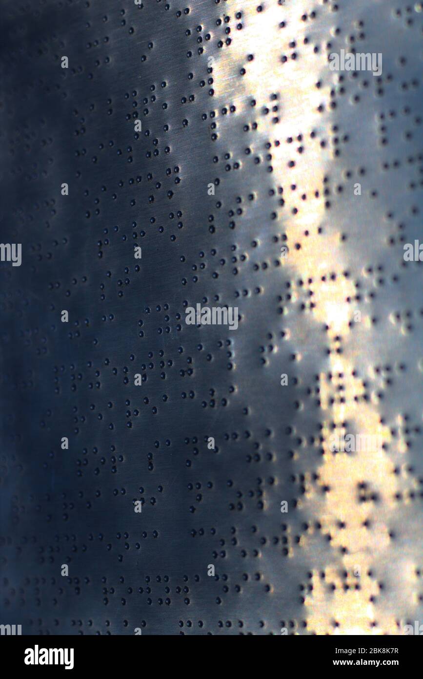 Metal plate written in Braille letters Stock Photo - Alamy
