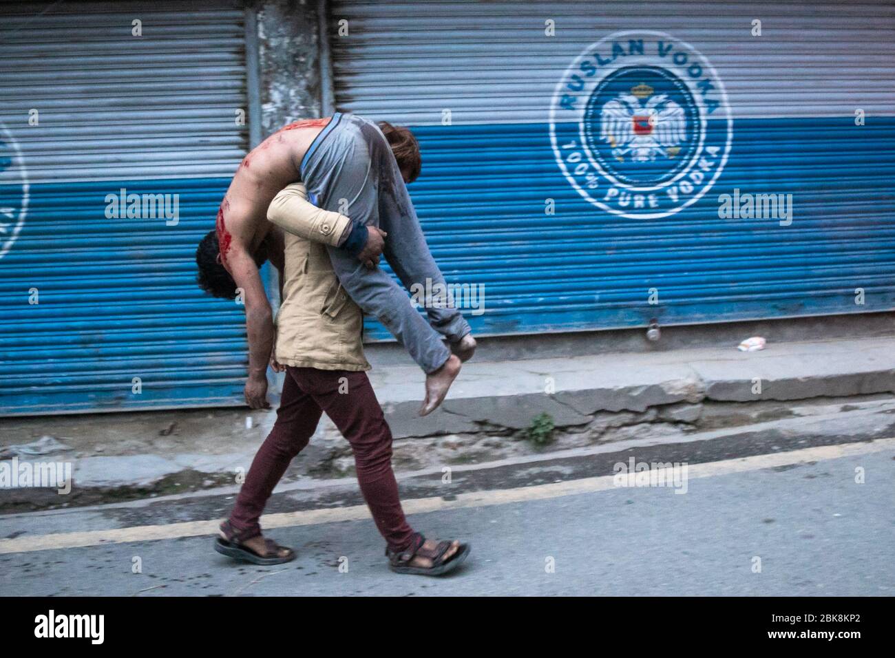 Carried unconscious hi-res stock photography and images - Alamy