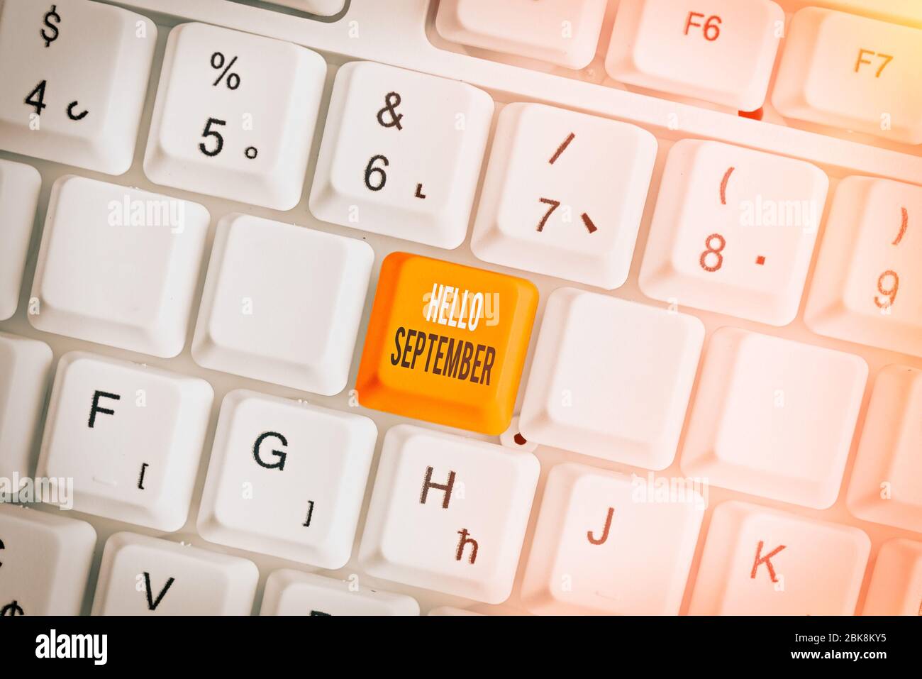 Writing note showing Hello September. Business concept for Eagerly ...