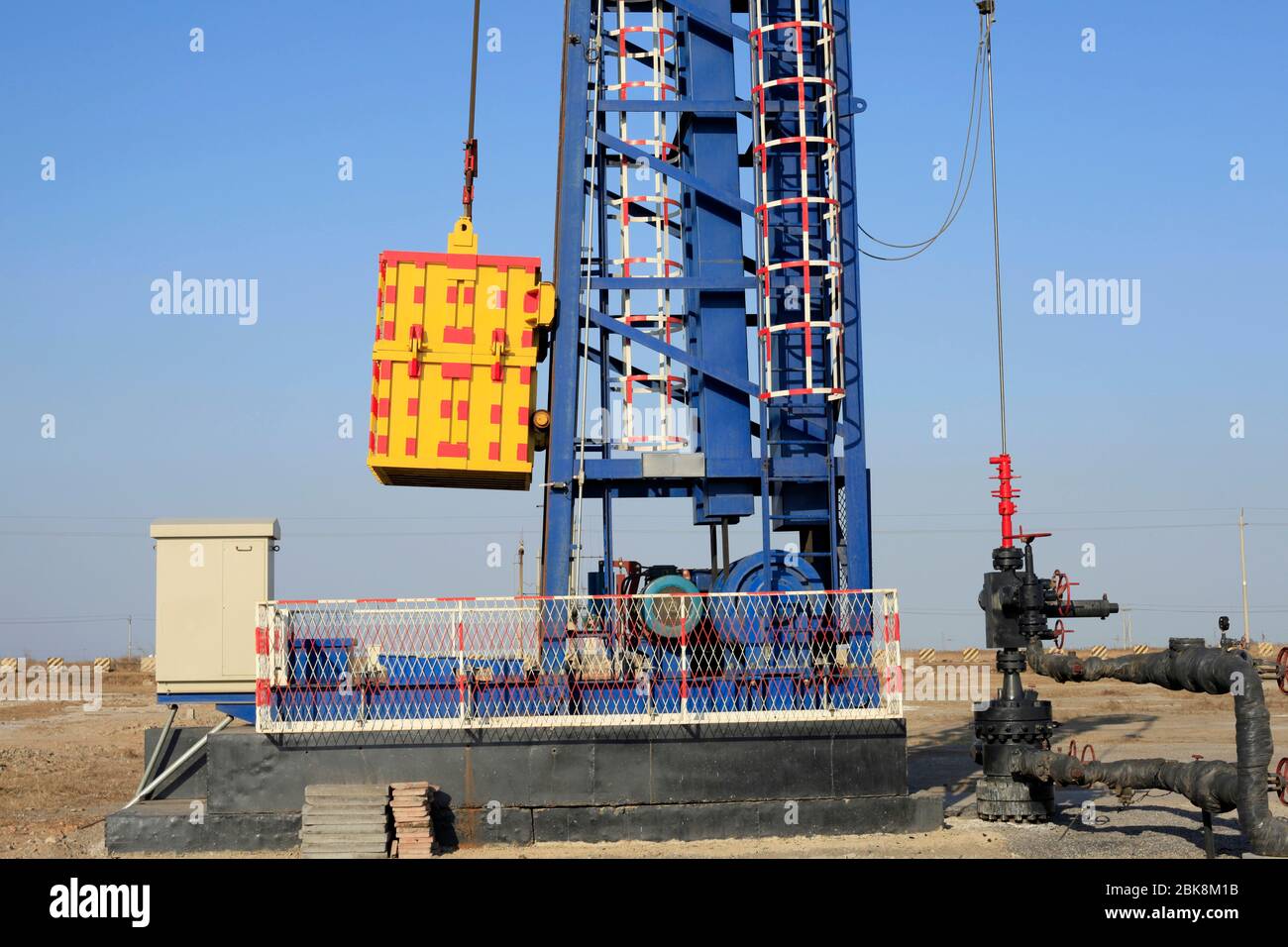 Oil field scene,Tower type pumping unit under the blue sky Stock Photo ...