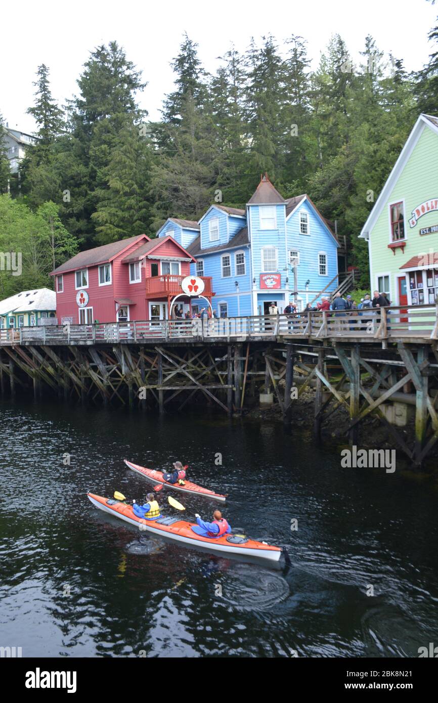 Kayaks and Creek Street boardwalk in the historic town of Ketchikan ...