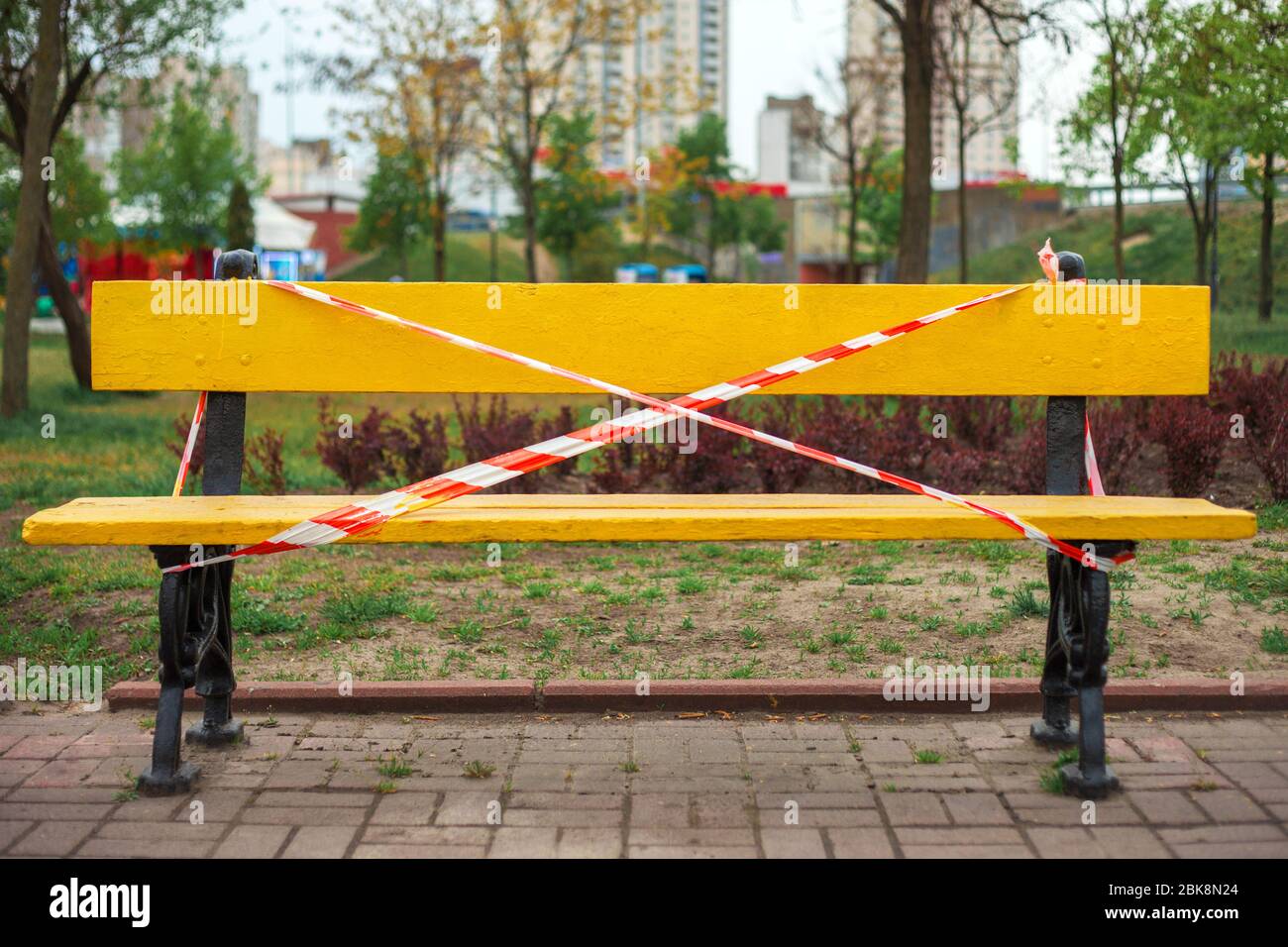 Quarantine. The ban on walking in the park. Red and white lines of ...