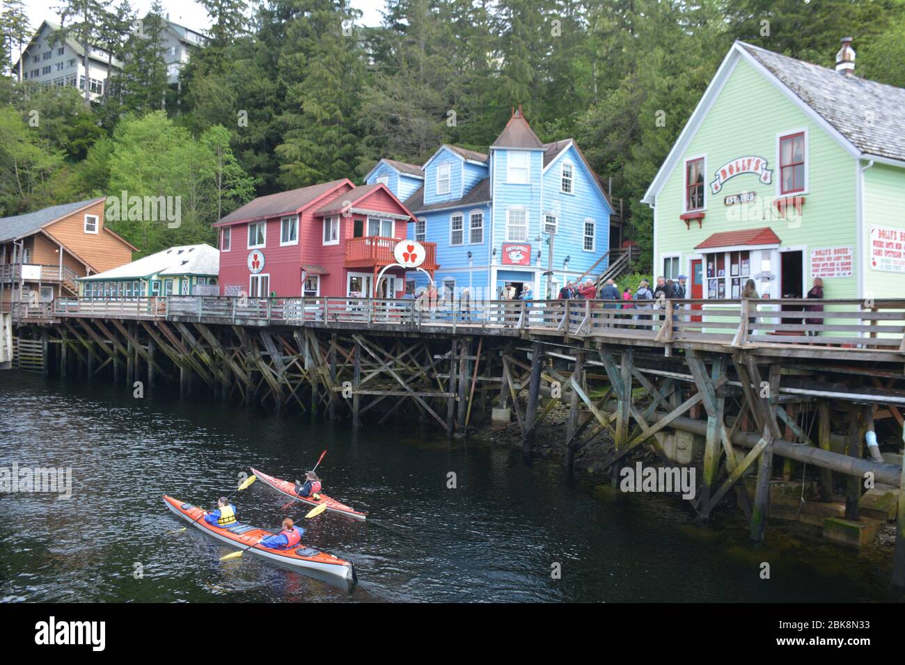 Kayaks and Creek Street boardwalk in the historic town of Ketchikan ...