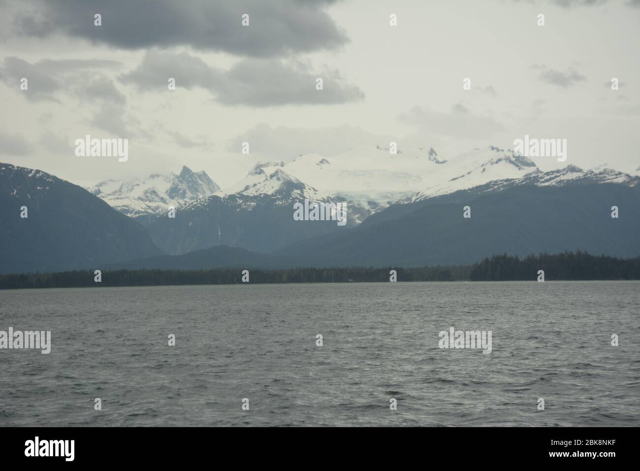 Views of mountains and glaciers sailing north up Frederick Sound from ...