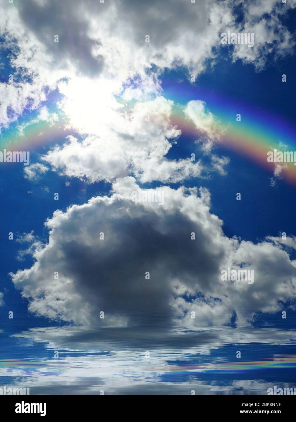 Natural background with rainbow in sea reflection Stock Photo - Alamy