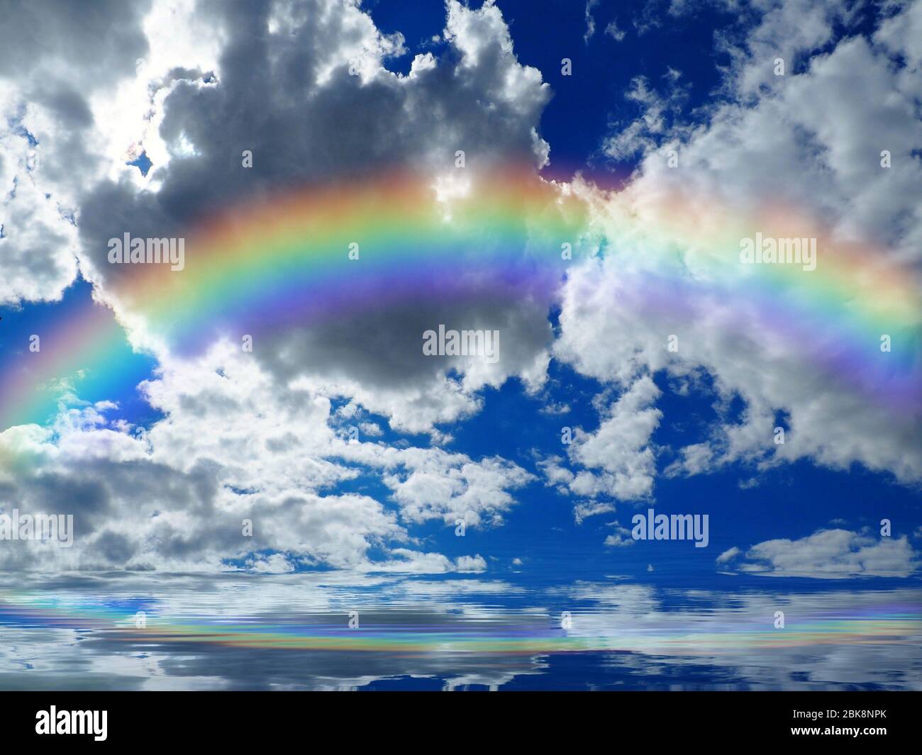Natural background with rainbow in sea reflection Stock Photo - Alamy