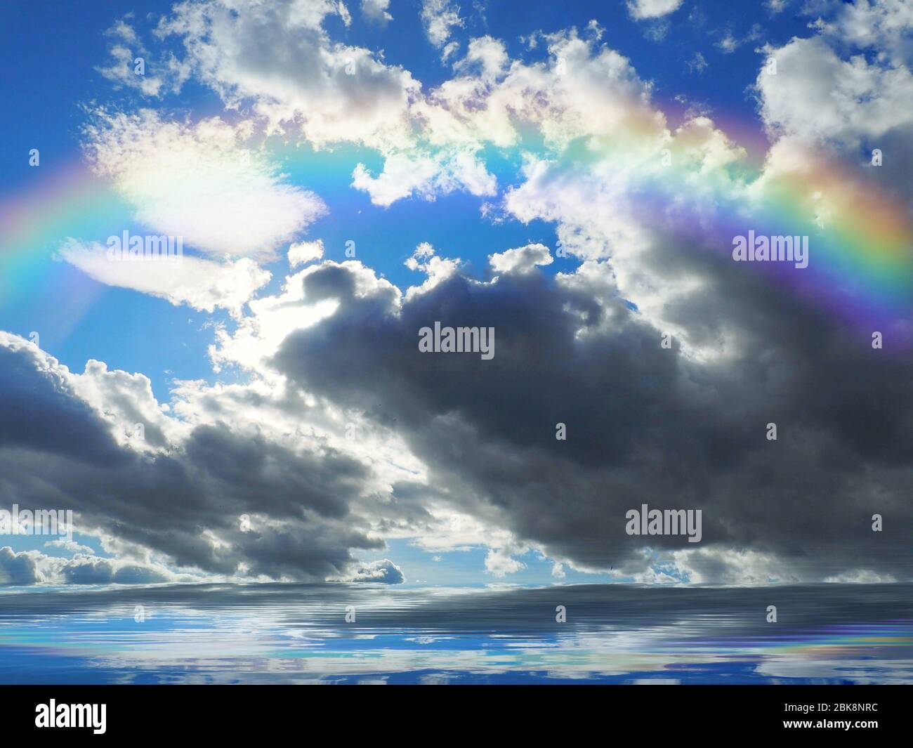 Natural background with rainbow in sea reflection Stock Photo - Alamy