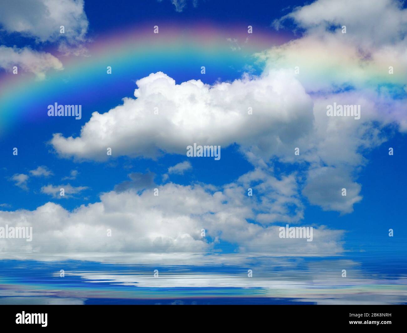 Natural background with rainbow in sea reflection Stock Photo - Alamy