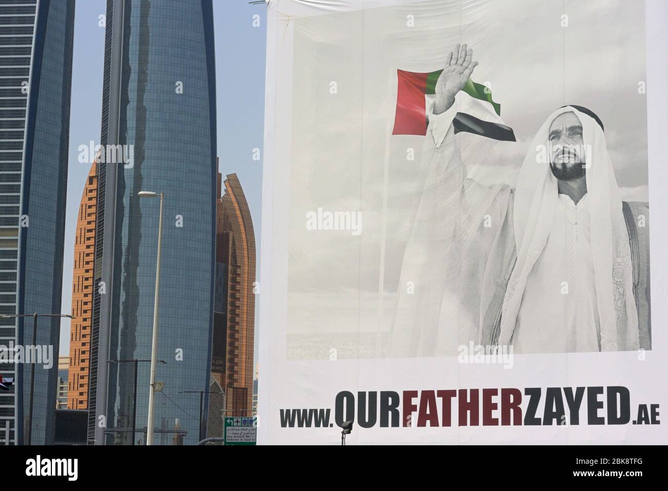 Our Father Sheikh Zayed billboard and the futuristic Etihad Towers, Abu ...