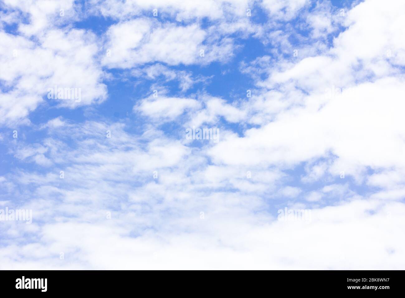Clear blue color sky with white cloud background Stock Photo - Alamy