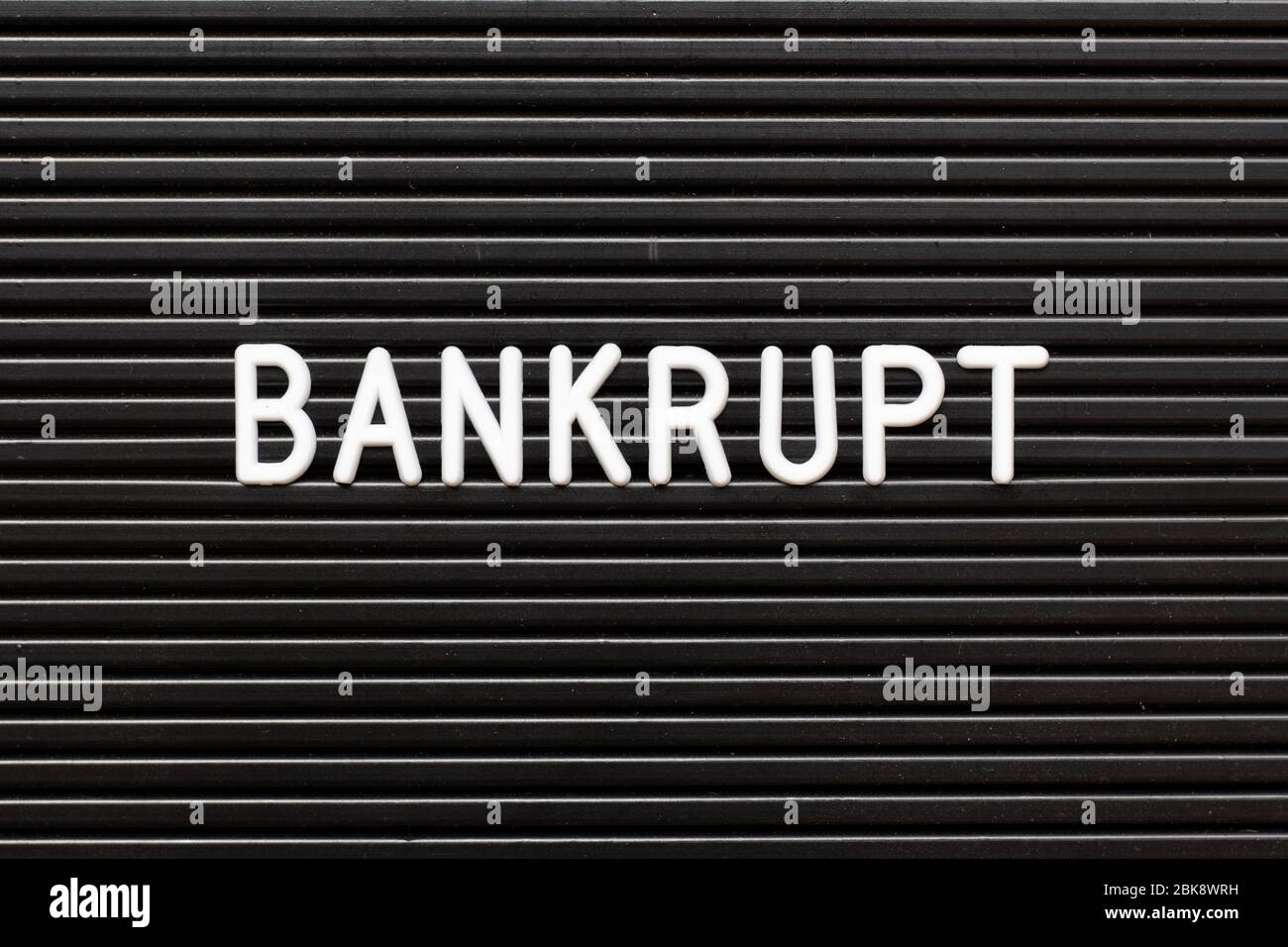 Black felt board with white alphabet in word bankrupt background Stock ...