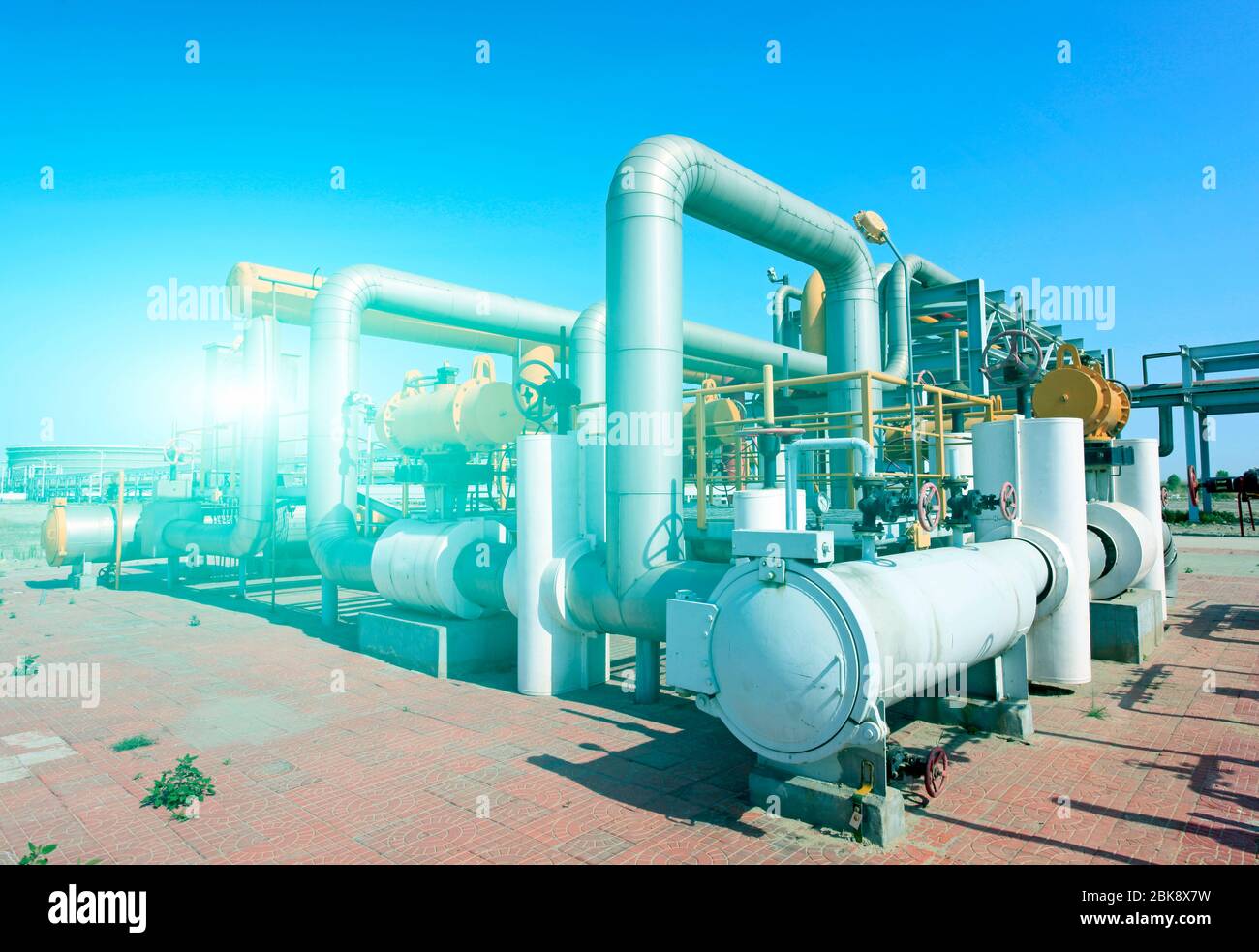 Oil field scene, oilfield equipment at work Stock Photo - Alamy