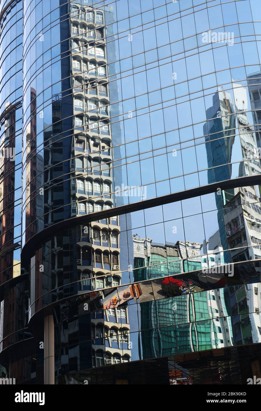 Old buildings reflected in the glass of the modern Langham place ...