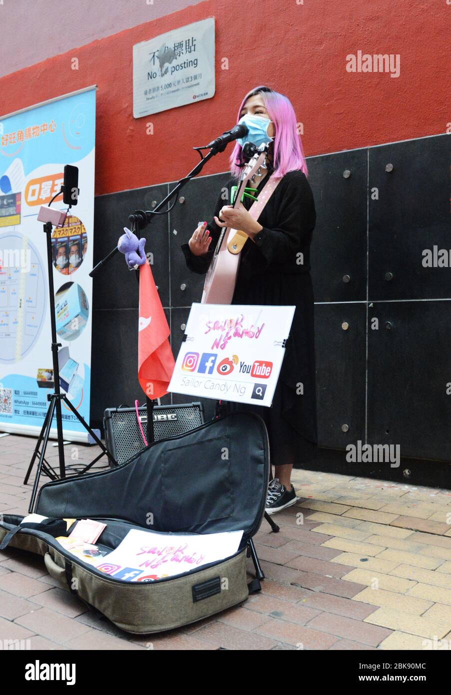 Sailor Candy NG performing on the streets of Mongkok, Hong Kong Stock ...
