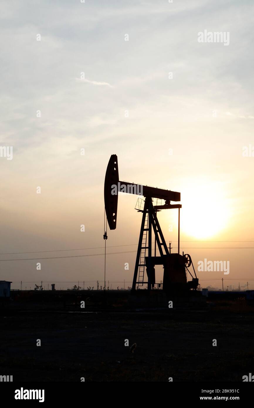 Beam pumping unit, also called a crank balanced beam pumping unit, the ...