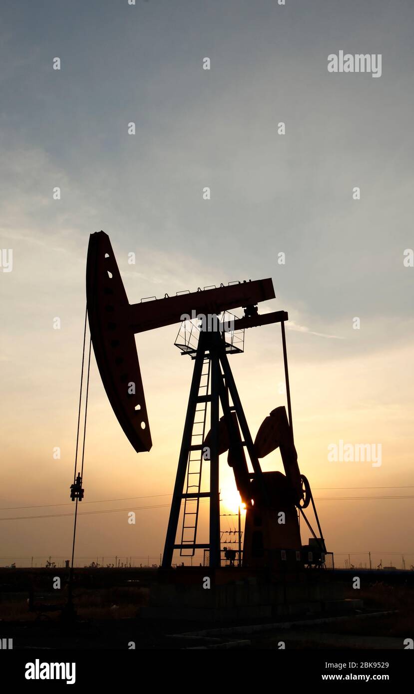 Beam pumping unit, also called a crank balanced beam pumping unit, the ...