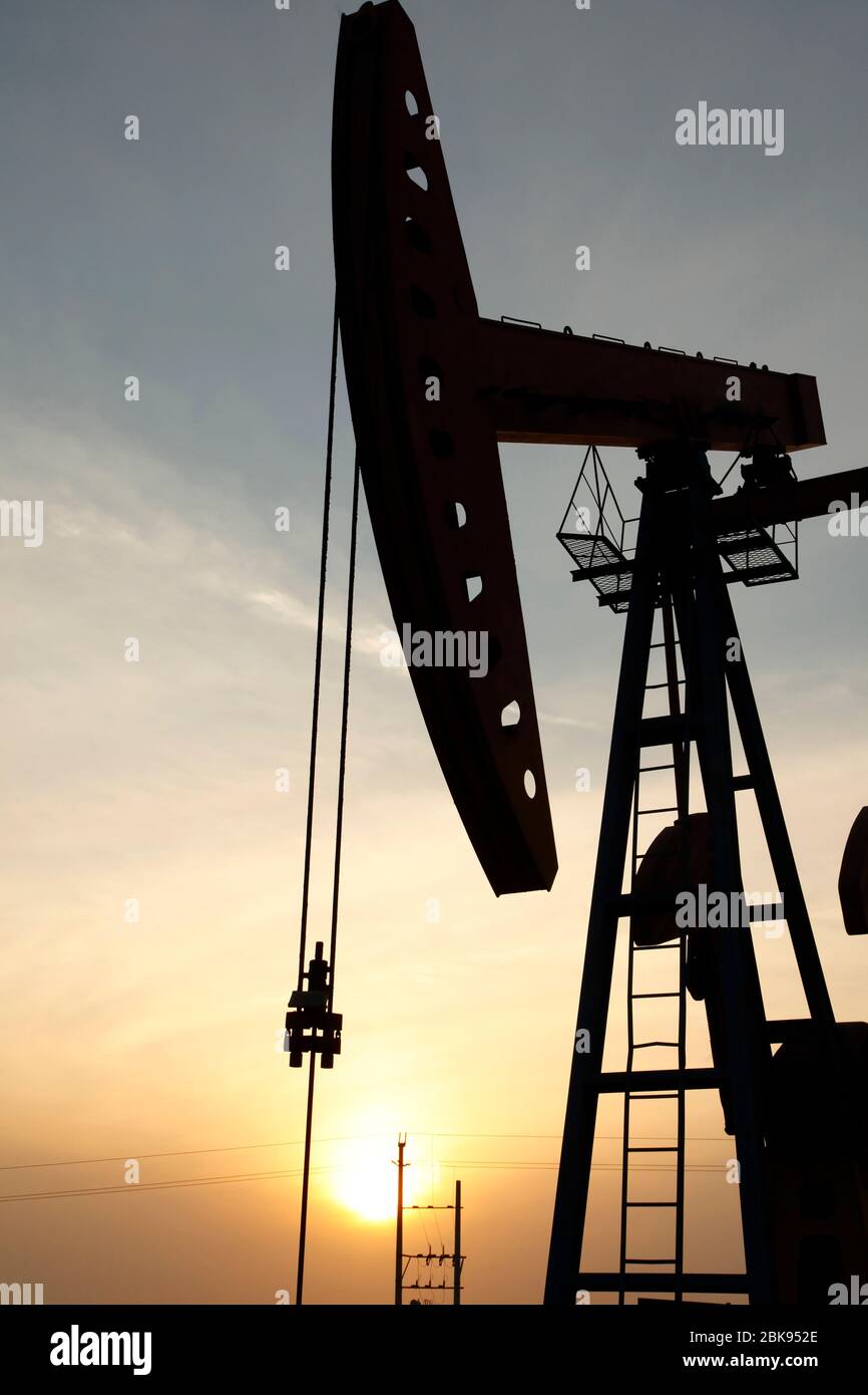 Beam pumping unit, also called a crank balanced beam pumping unit, the ...