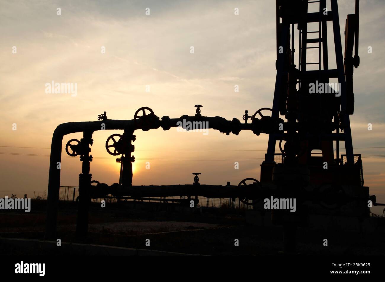 Oil field scene, oil pipelines and facilities Stock Photo - Alamy
