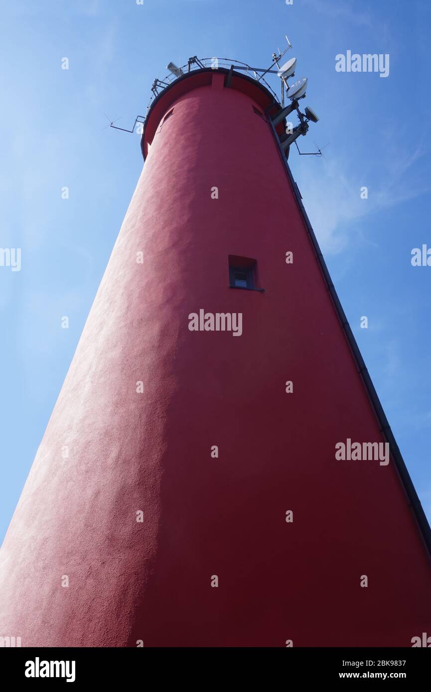 Red lighthouse - view from below Stock Photo - Alamy