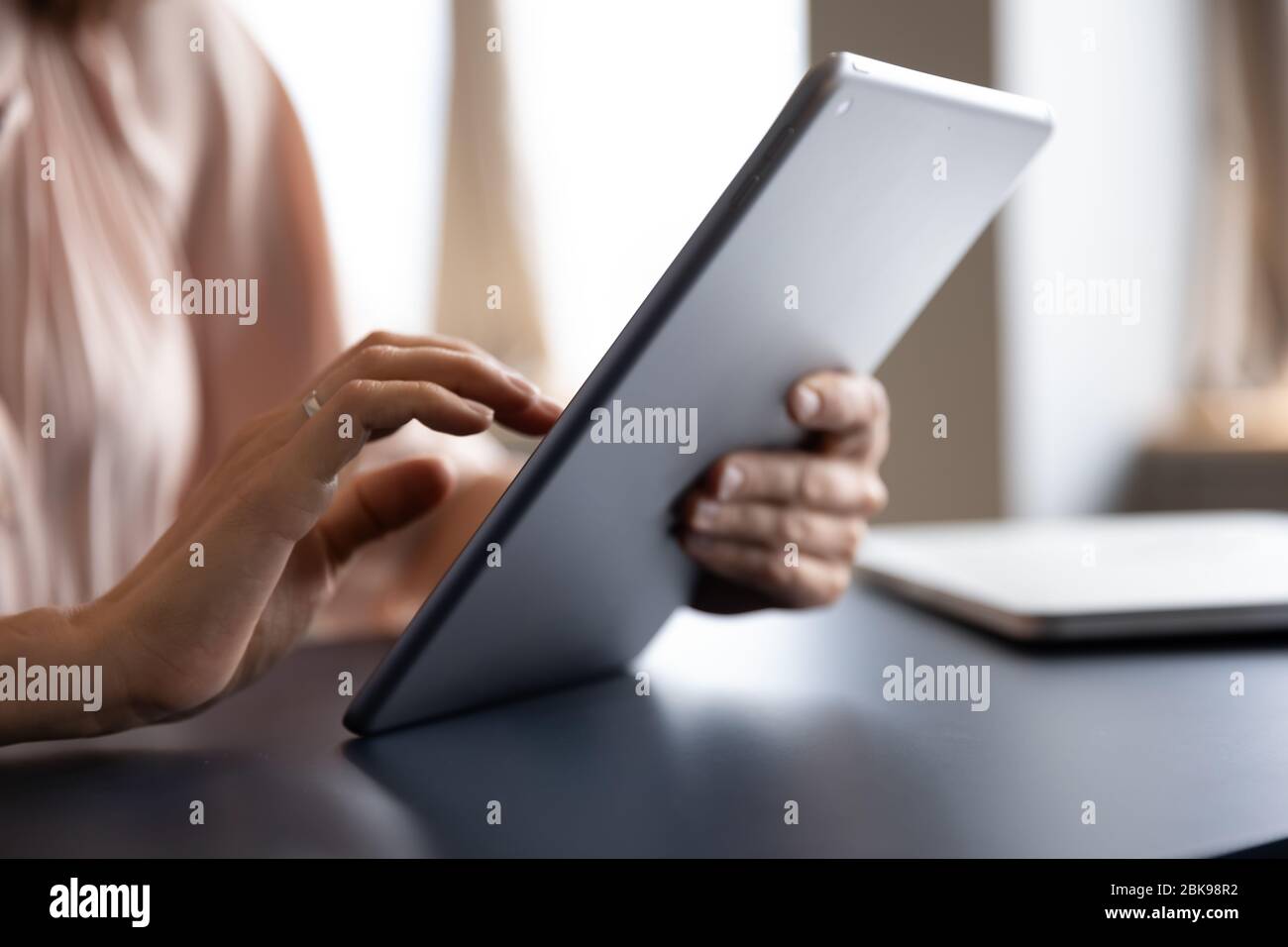 Close up female hands holding computer tablet, using gadget Stock Photo ...