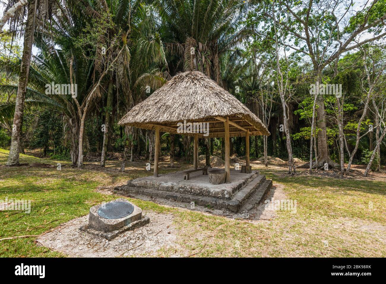 Kohunlich, Mexico - April 25, 2019: Straw roof gazebo and a memorial ...