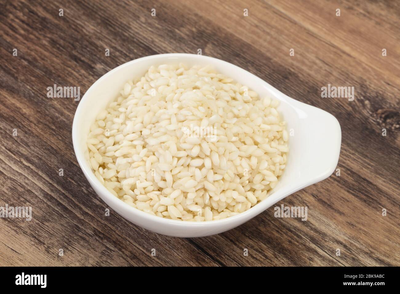 Raw Arborio rice for Italian risotto Stock Photo - Alamy