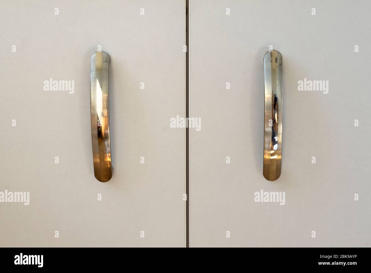 bright double door with 2 metal handles. polished steel handles Stock ...