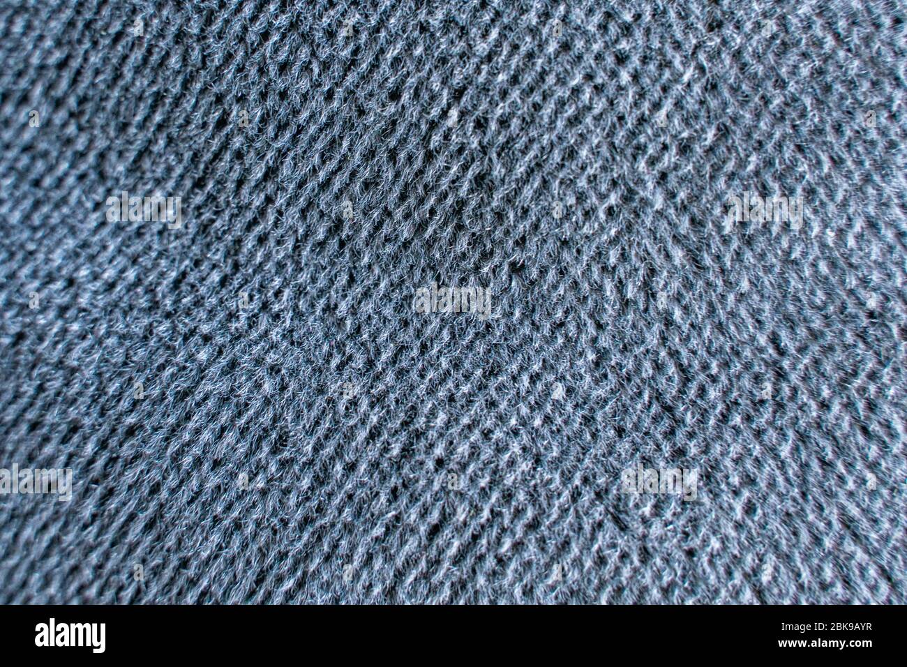 Saturated gray fabric texture. grunge background. pile, hairy threads ...