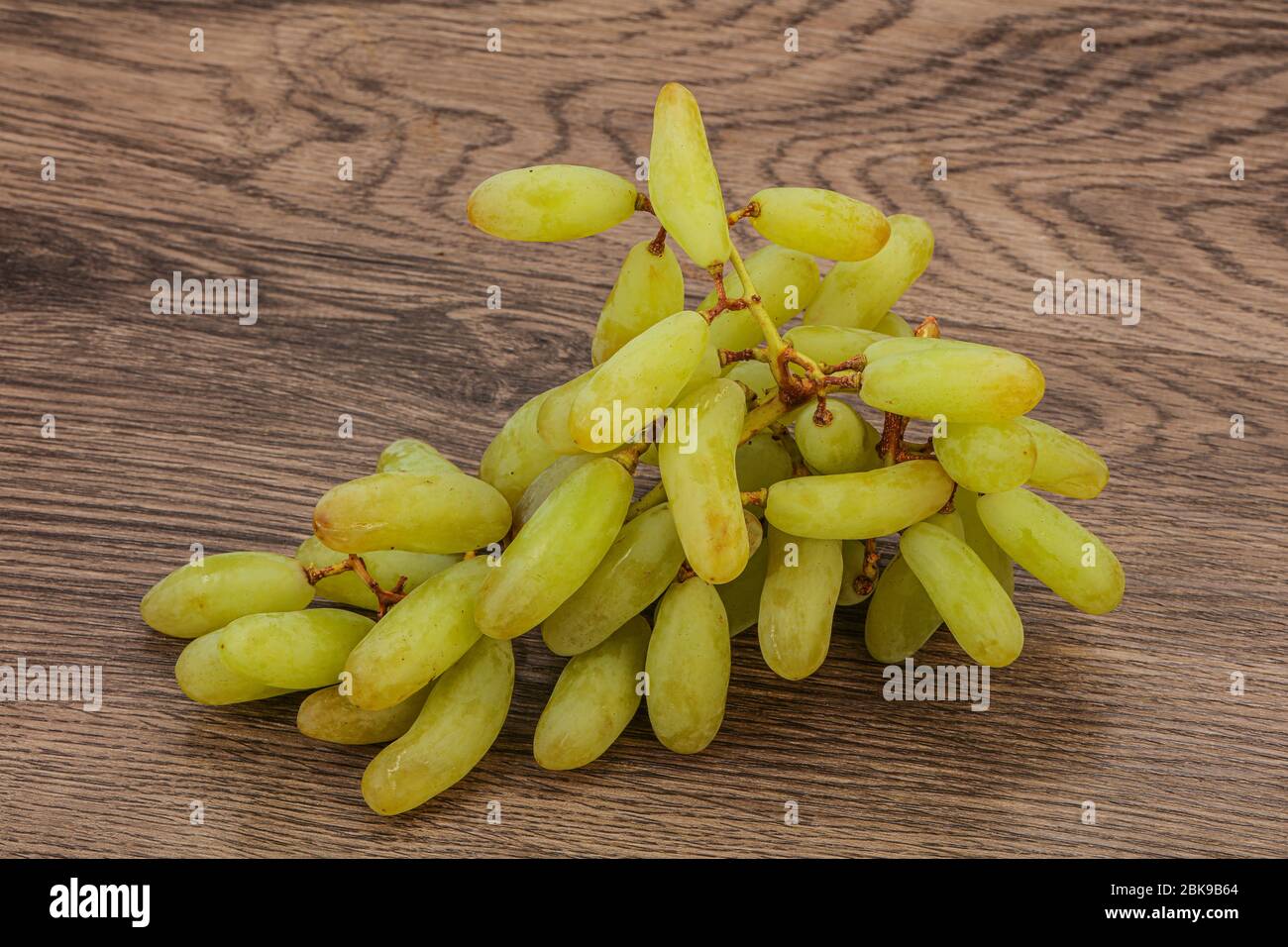 Fresh sweet tasty Green Grape heap Stock Photo - Alamy