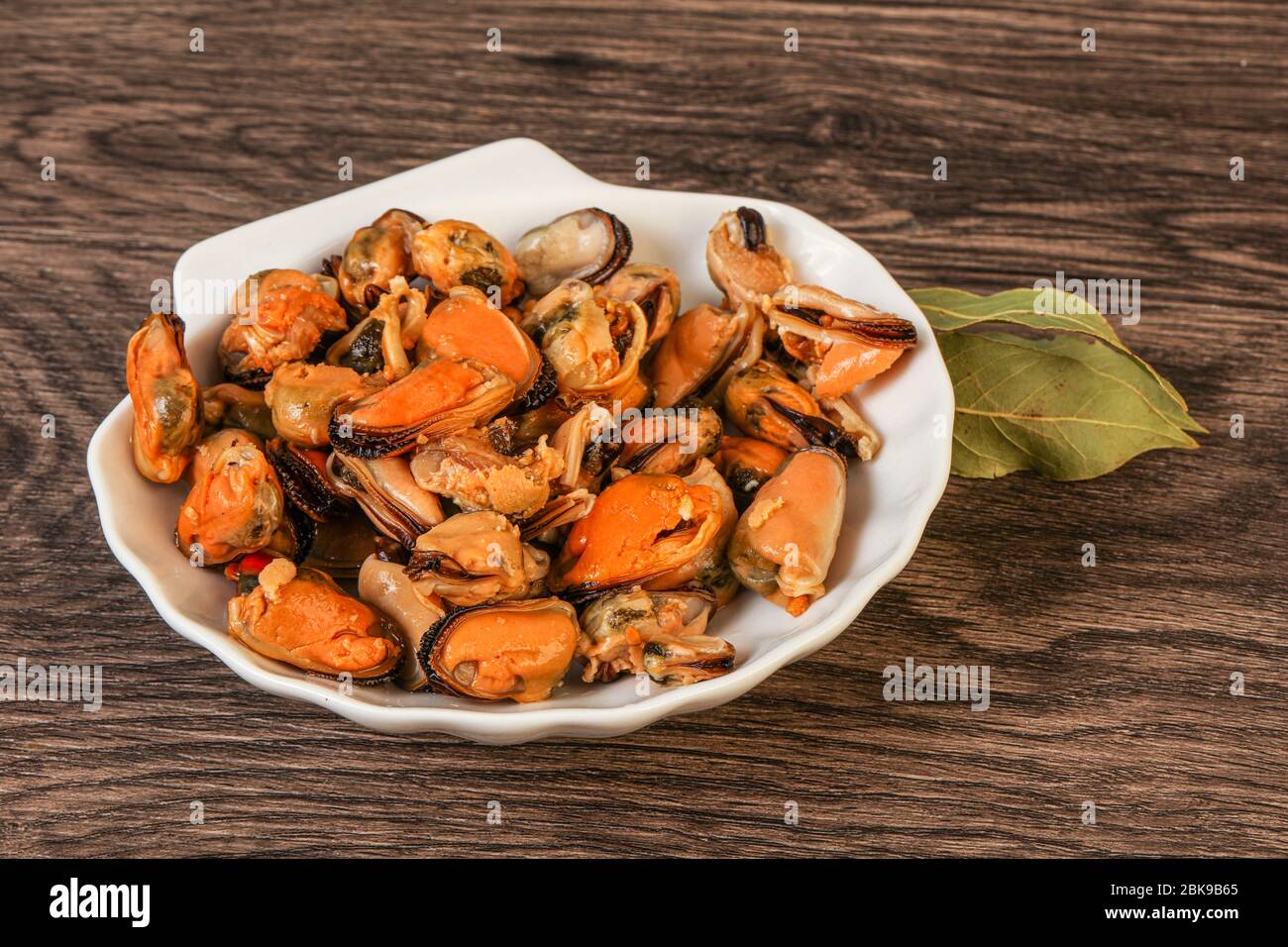 Pickled mussels with spices in the bowl Stock Photo - Alamy