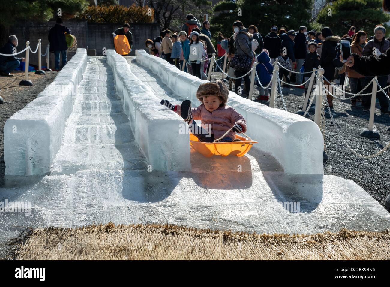 Children With Ice Sculpture High Resolution Stock Photography and ...