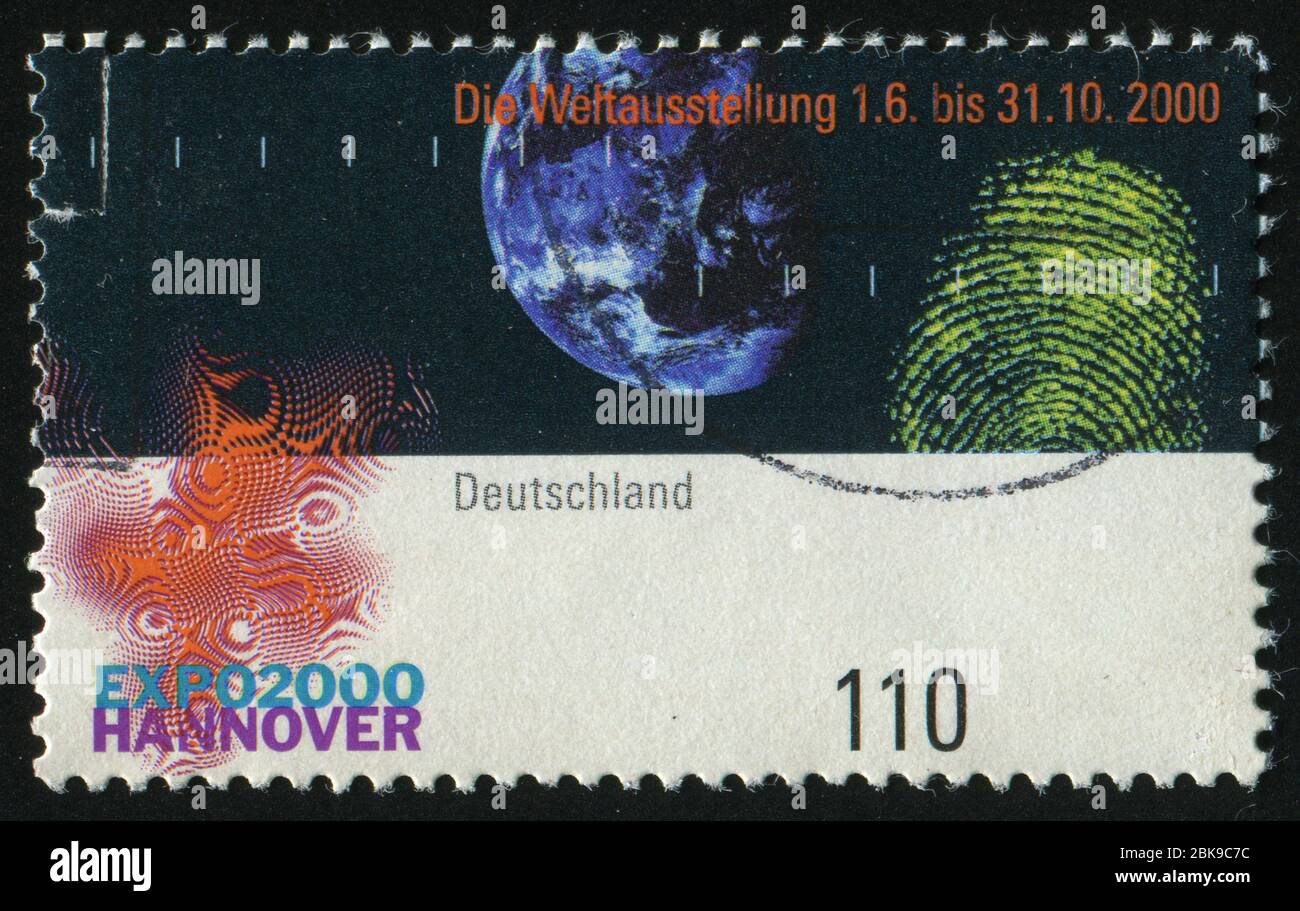 GERMANY- CIRCA 2000: stamp printed by Germany, shows Expo emblem, Earth ...