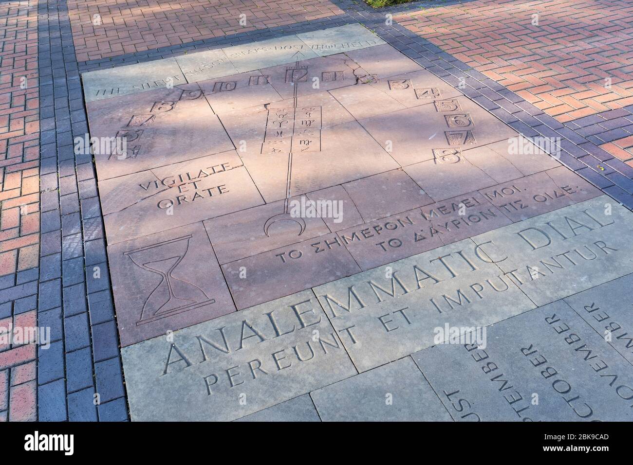 Carved panel with an analemmatic sundial with the viewer acting as the ...