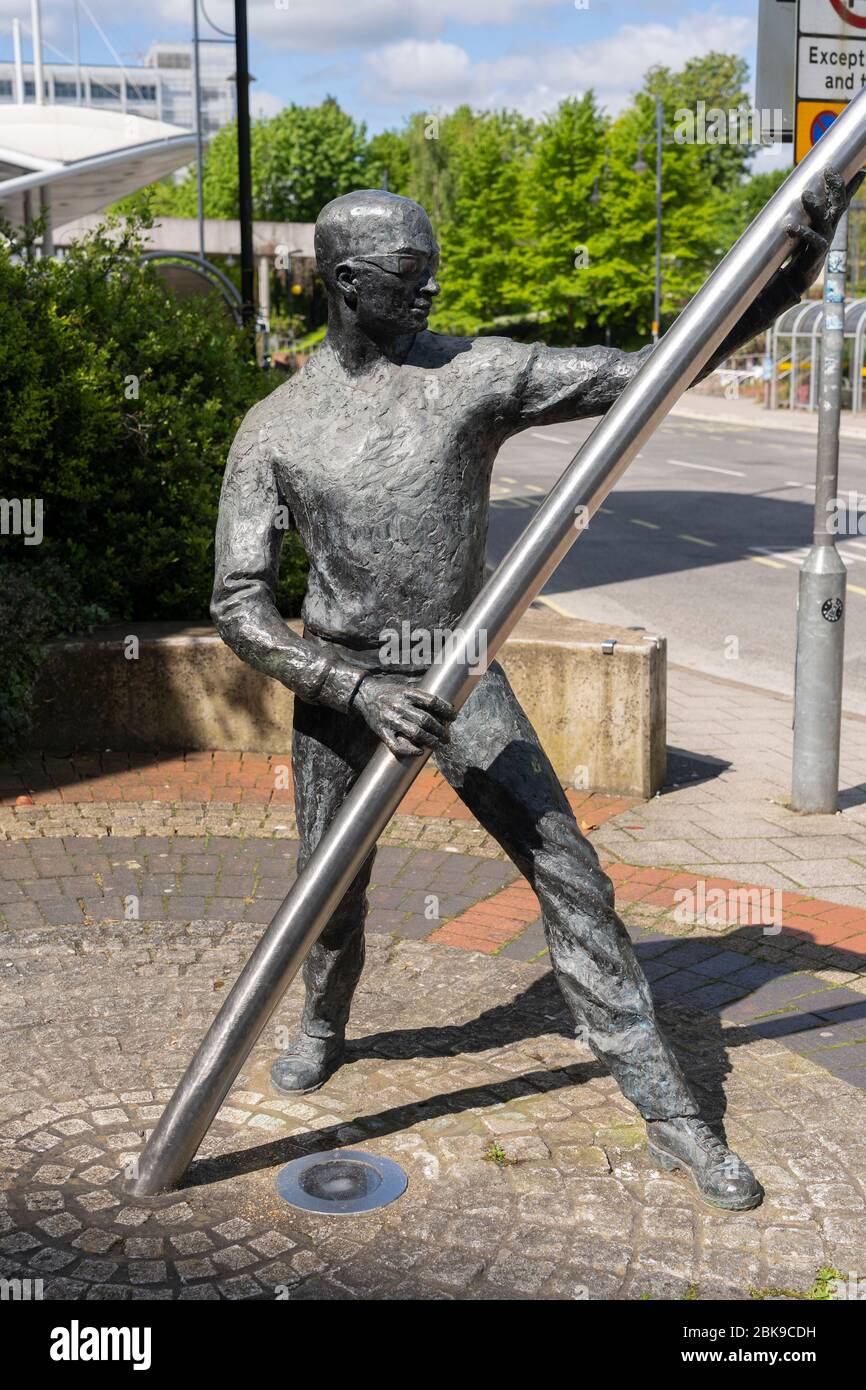 L'Arc - one of two figures holding a curved pole that was inspired by ...