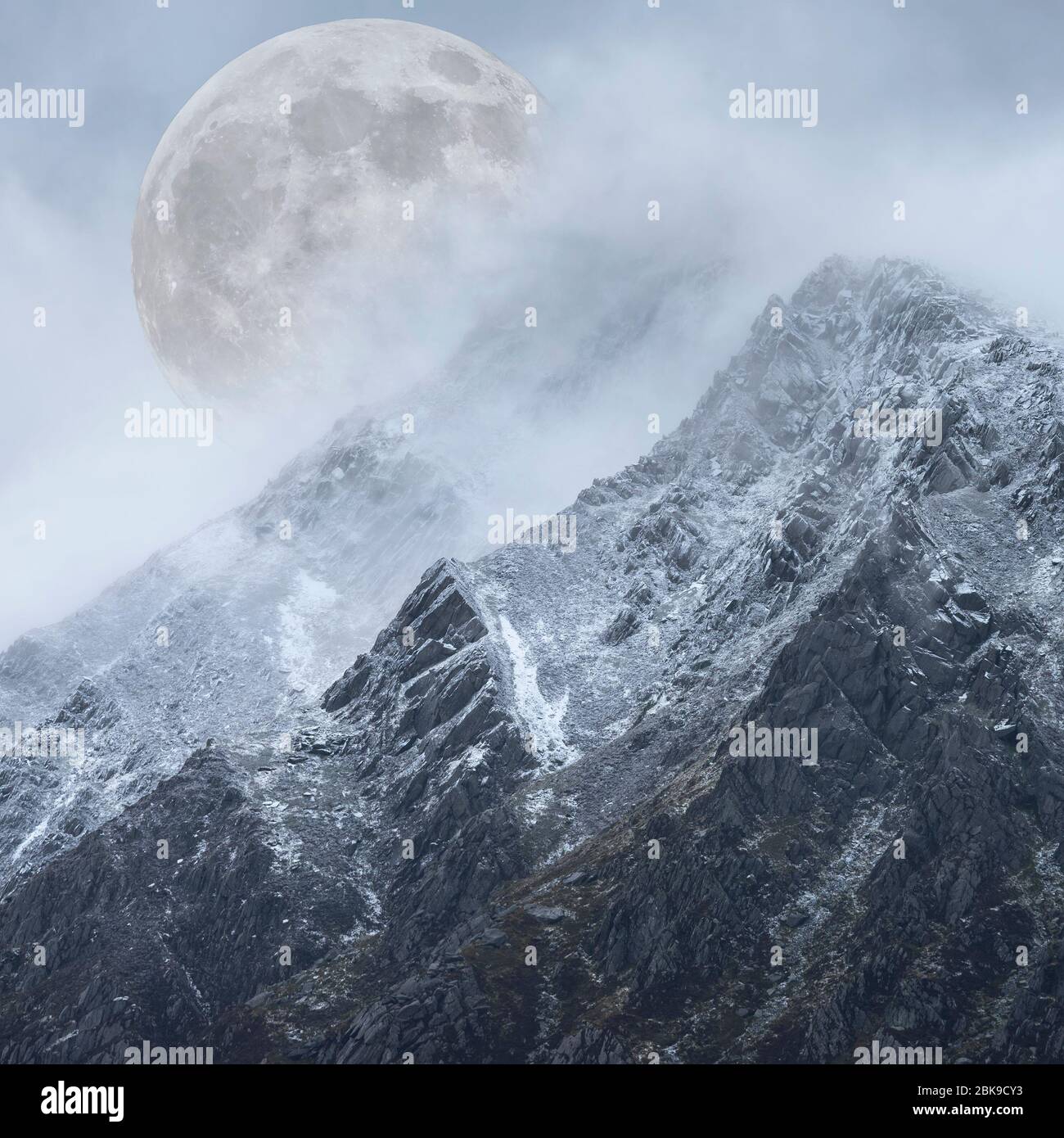 Beautiful digital composite image of Supermoon above mountain range ...