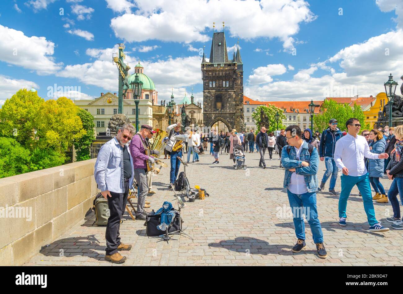 Prague, Czech Republic, May 13, 2019: street musicians are playing ...