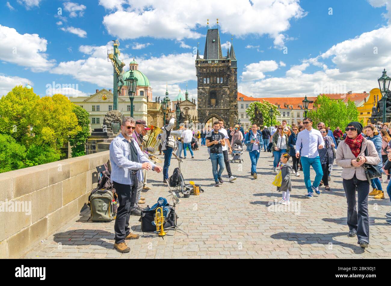 Prague, Czech Republic, May 13, 2019: street musicians are playing ...