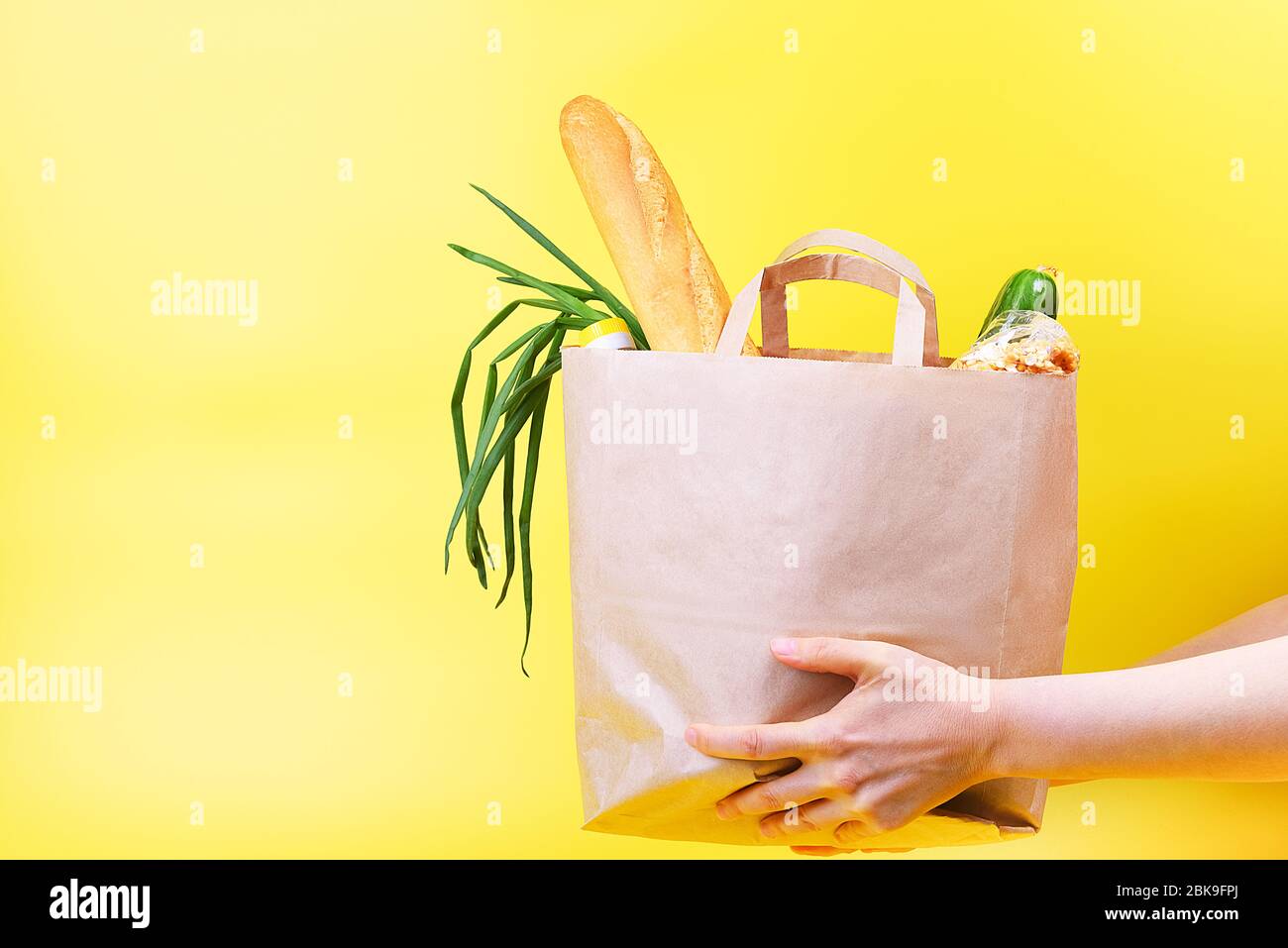 Food donation on yellow hi-res stock photography and images - Alamy