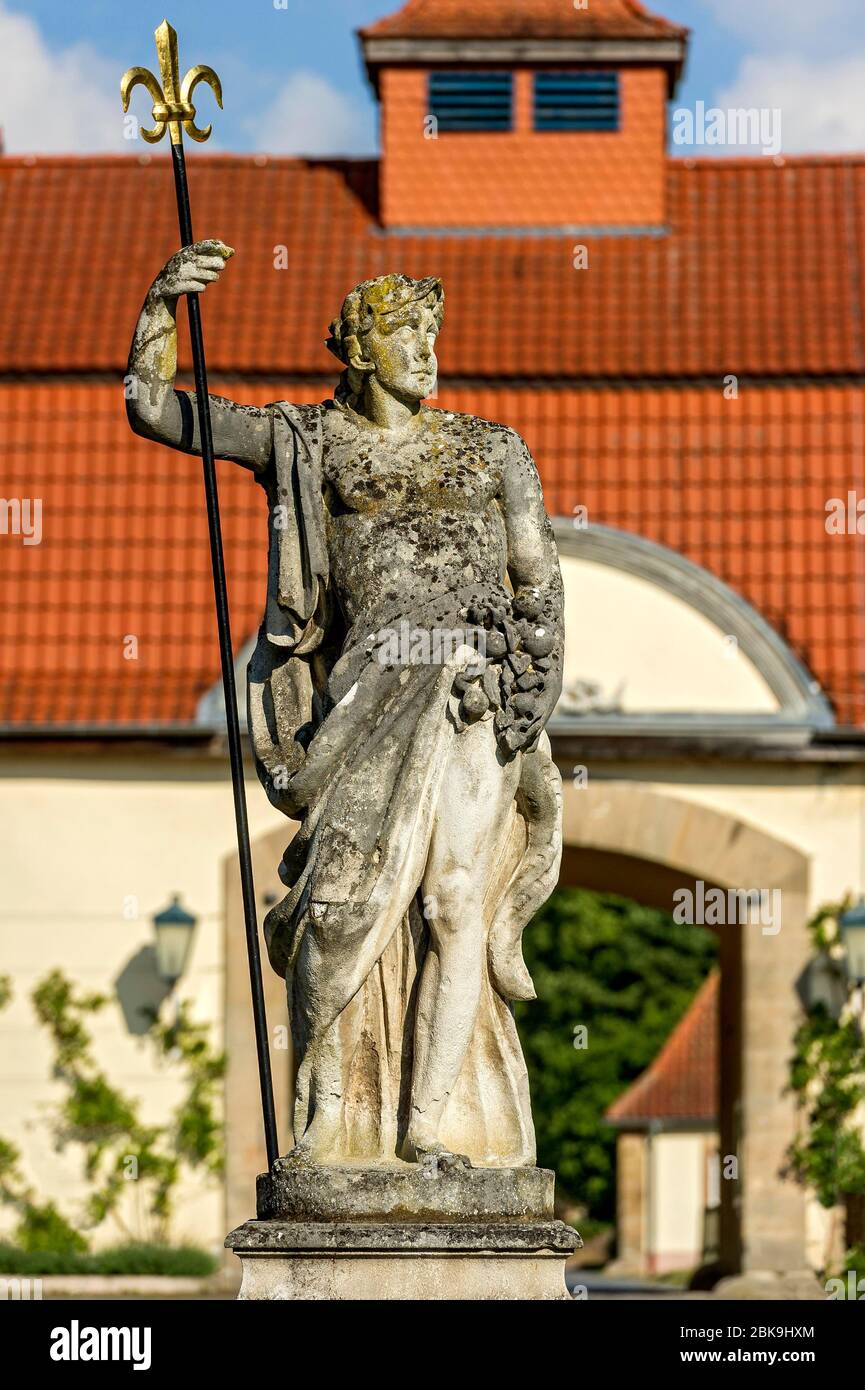 Sculpture of the sea god Neptune at the Neptune Fountain, farm yard in ...