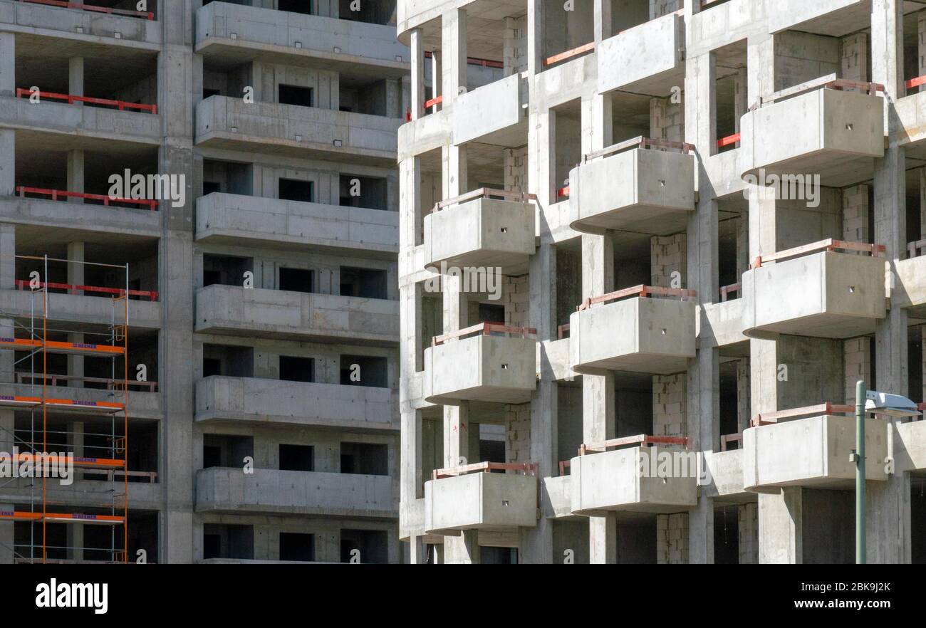 New building facade in shell with balconies, Berlin, Friedrichshain ...