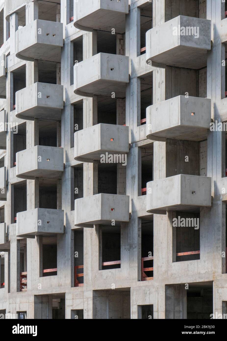 New building facade in shell with balconies, Berlin, Friedrichshain ...