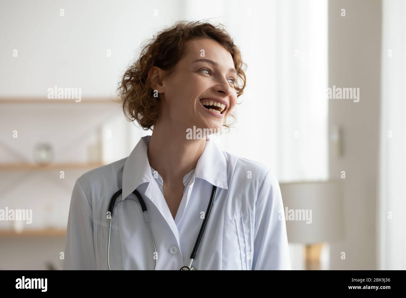 Female doctor laughing hi-res stock photography and images - Alamy